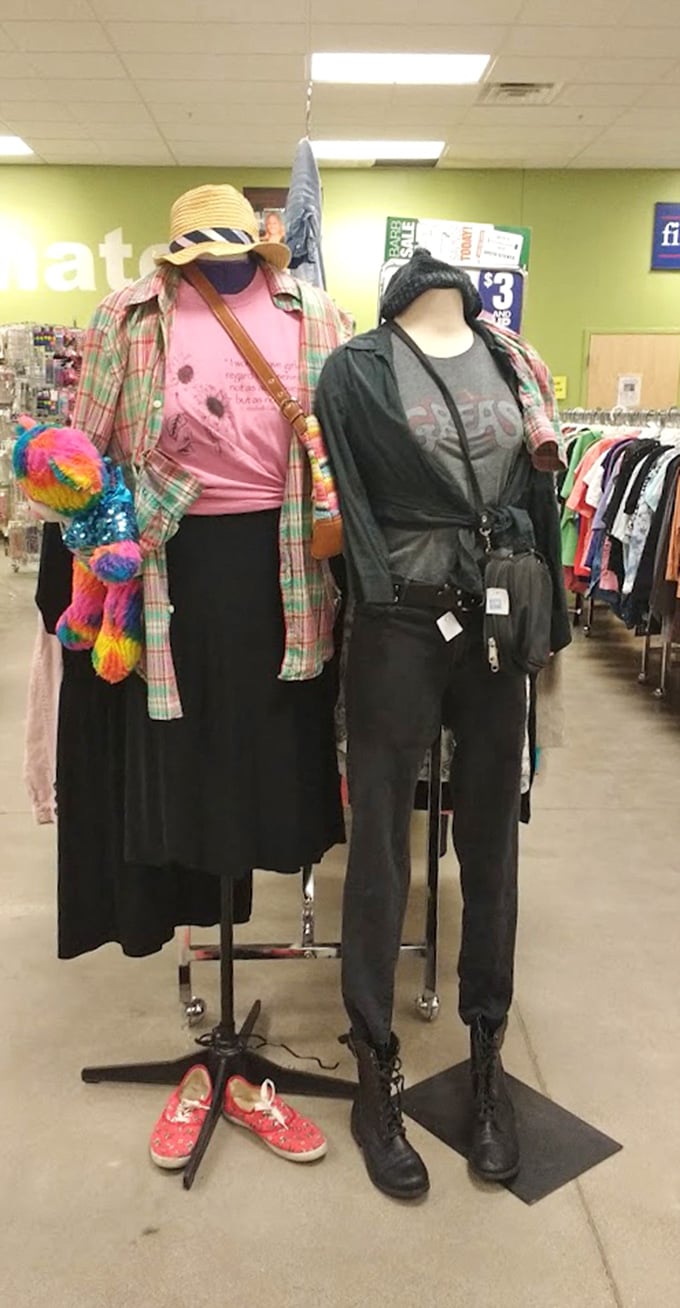 Mannequins model creative outfit possibilities, proving that secondhand style can be both budget-friendly and fashion-forward.