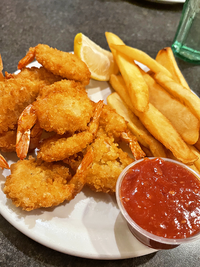 Fried shrimp that crunch like autumn leaves, served with fries and cocktail sauce&mdash;seafood that's traveled inland but hasn't forgotten its roots.