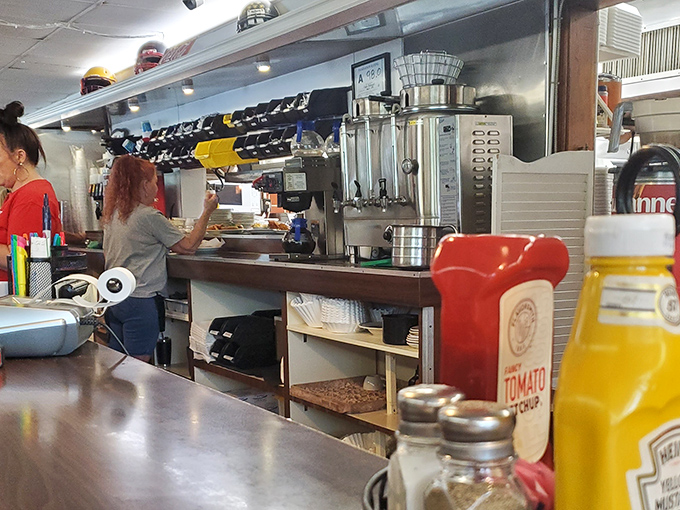 Behind the scenes, where the magic happens &ndash; Clyde's kitchen staff works with practiced efficiency to keep hungry customers satisfied.