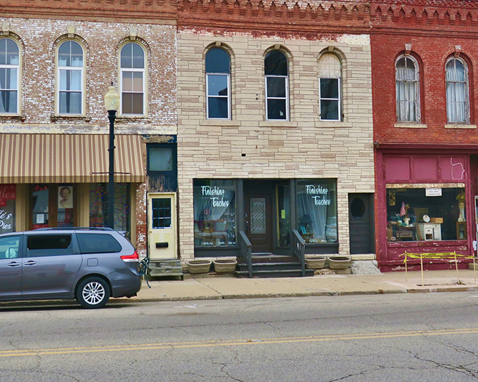 These storefronts in cream, brick, and burgundy showcase the architectural equivalent of a well-coordinated outfit &ndash; different but harmonious.
