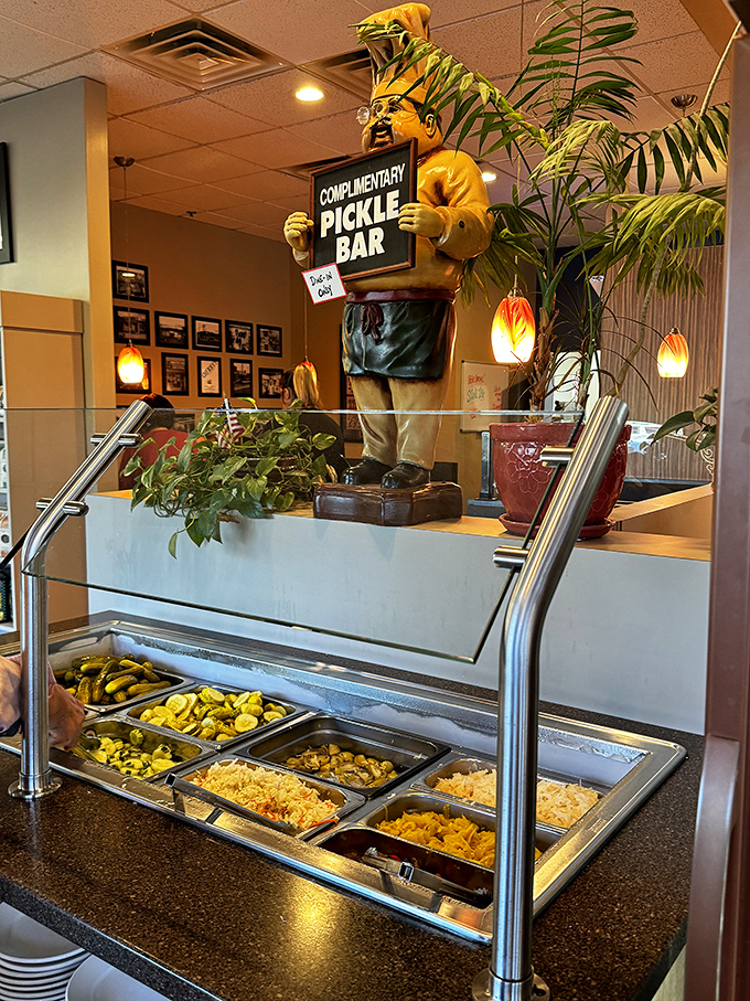 The complimentary pickle bar stands guard, offering tangy treasures to accompany your sandwich masterpiece perfectly.
