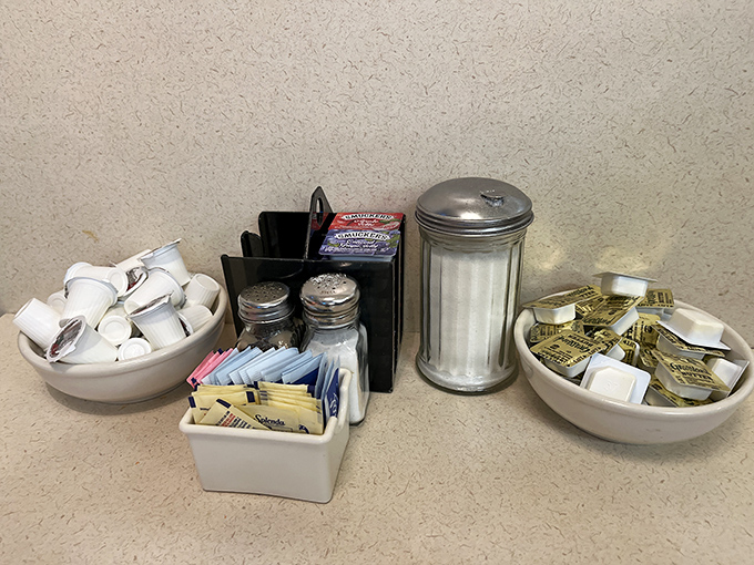 The condiment caddy: silent supporting actor in your dining experience. Sugar packets, salt shakers, and those mysterious jellies in tiny containers.