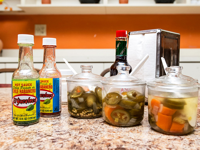The condiment station &ndash; those jars of pickled jalape&ntilde;os and carrots are the secret weapons that let you customize your heat level with delicious precision.