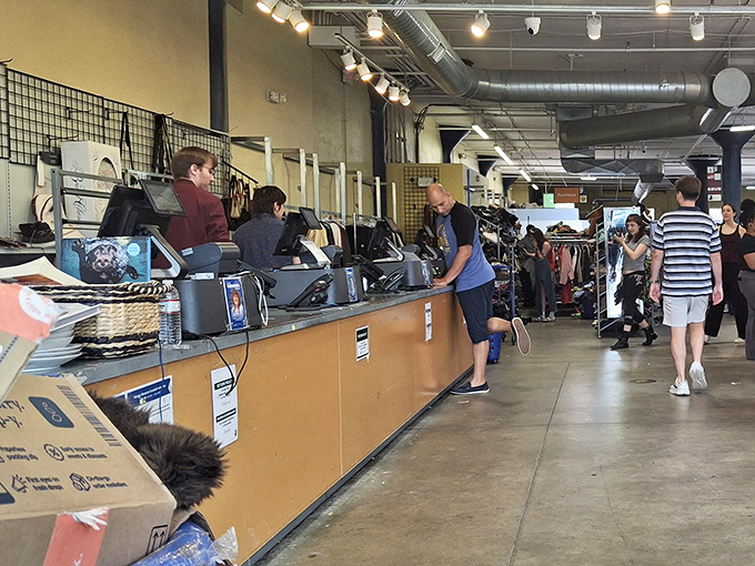 The checkout counter buzzes with satisfied treasure hunters cashing in on their finds without breaking the bank today.