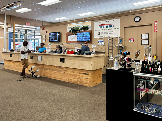 The checkout counter: where friendly staff turn your treasure hunt into a done deal. The jewelry display case often holds the day's most surprising finds.
