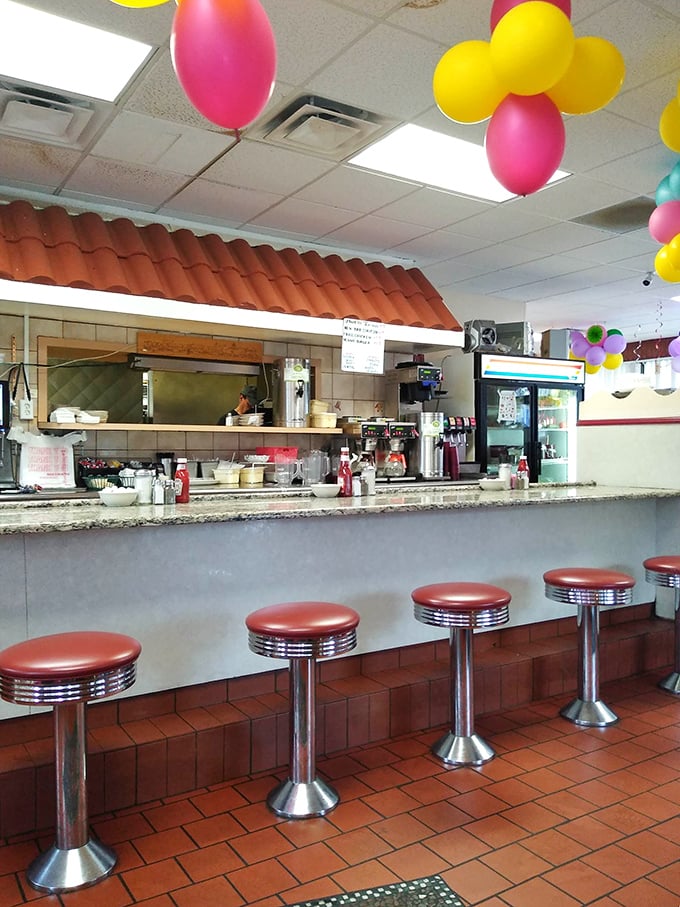 The counter seating offers front-row tickets to the short-order cooking show, complete with sizzling sound effects and aromatic special effects.