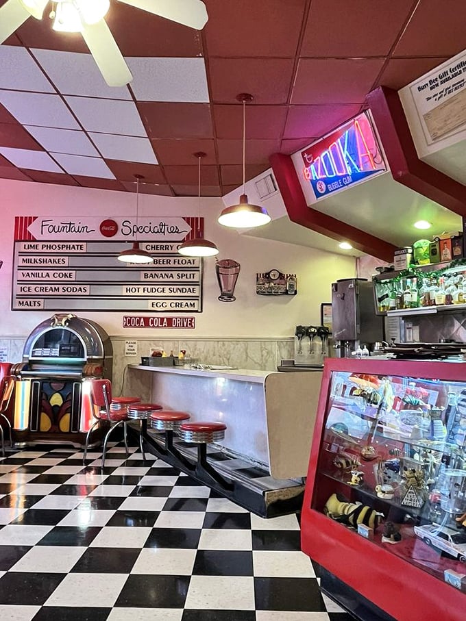 The counter where breakfast dreams come true. That vintage milkshake menu promises the kind of treats that modern smoothie shops can't touch.