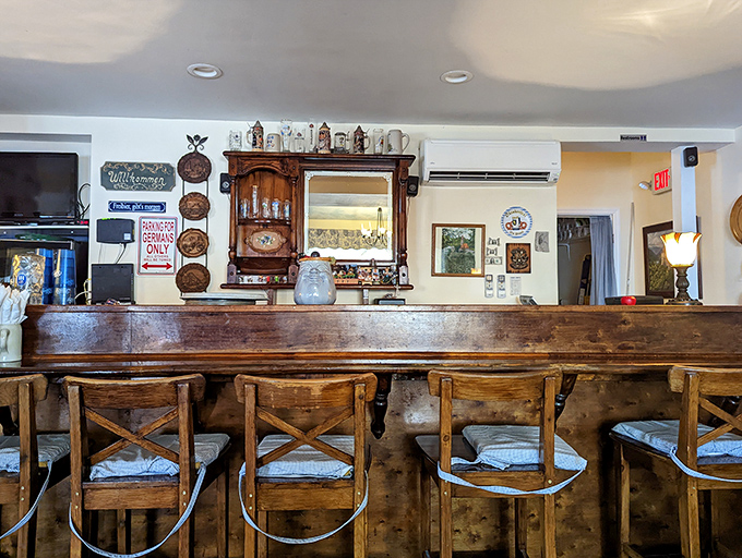 The bar area feels like the world's coziest German tavern. Those wooden stools have probably supported countless happy diners enjoying "just one more" beer.
