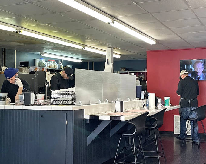 The counter seating offers front-row tickets to the sandwich-making show. Like watching culinary jazz&mdash;improvised yet precise.