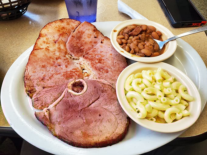 Country ham that's been smoked to perfection, paired with creamy mac and cheese and pinto beans. Southern comfort on a plate.