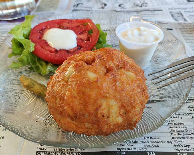 This golden-fried crab cake with its perfect tomato companion isn't just lunch&mdash;it's Delaware's answer to culinary royalty.
