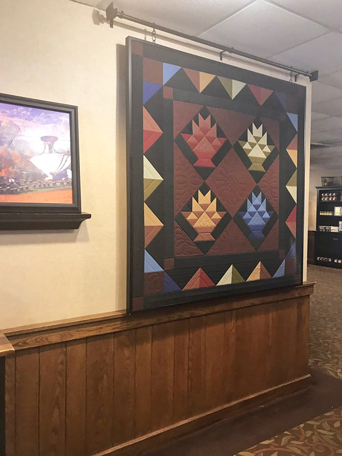 Handcrafted quilts don't just decorate walls here&mdash;they tell stories of tradition and craftsmanship that mirror what's happening in the kitchen.