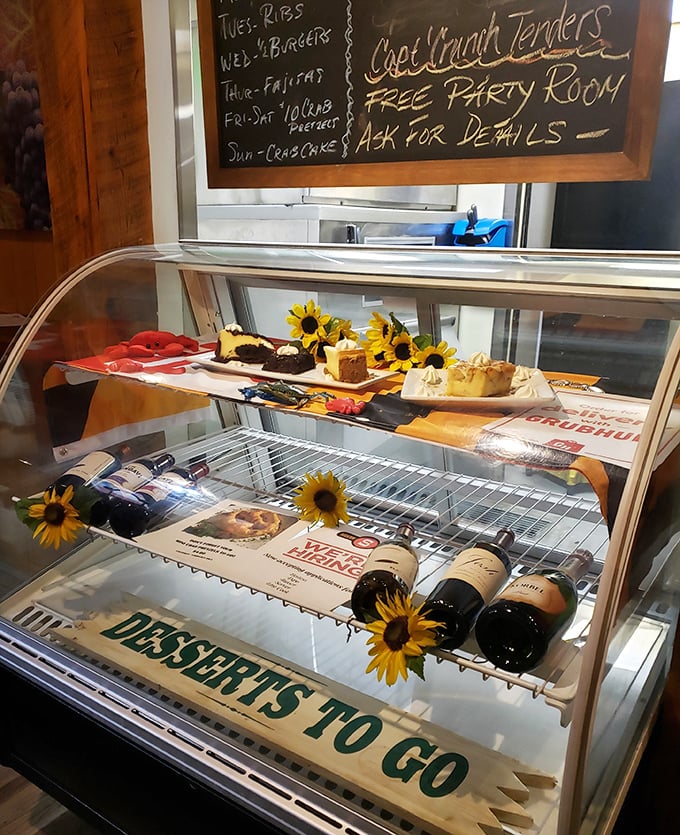 The dessert case that makes "I'll just look" the biggest lie you'll tell yourself today. Those sunflowers are just nature's way of pointing to the sweets.