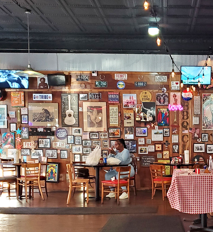 Every inch of wall space tells a story &ndash; from Elvis to local heroes. This diner knows she's sitting in a temple of smoke and flavor.