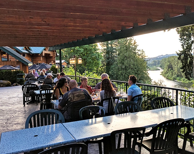 Happiness is a table with friends and a view of the river. These diners know they've found Oregon's sweet spot.