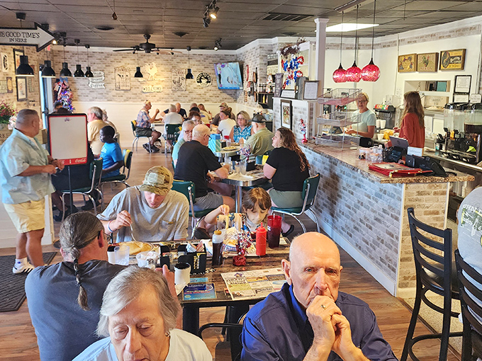 A bustling dining room where strangers become temporary neighbors, united by the universal language of "pass the syrup, please."