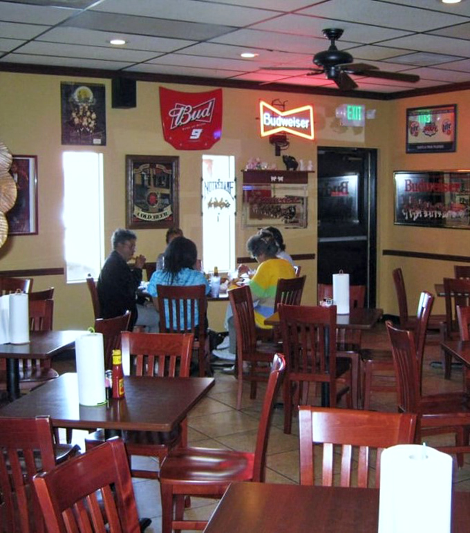 Where strangers become neighbors over shared appreciation of smoke-kissed proteins. The half-empty tables tell you everyone else is already eating.