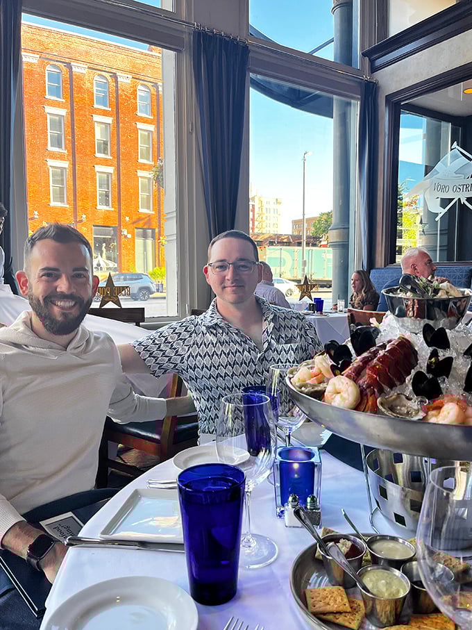 The look of pure joy when the seafood tower arrives. Some moments deserve to be immortalized&mdash;this tower of oceanic treasures is definitely one of them.
