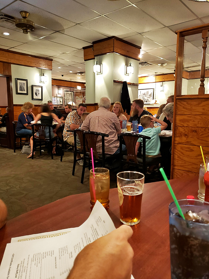 Families gather around tables where memories are made between bites of barbecue&mdash;the true measure of a neighborhood institution.