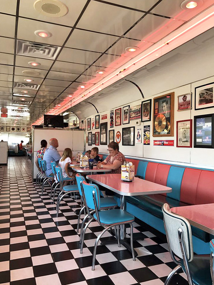 The classic booth experience &ndash; where families have been sliding into turquoise and red vinyl seats for generations of pancake-fueled conversations.