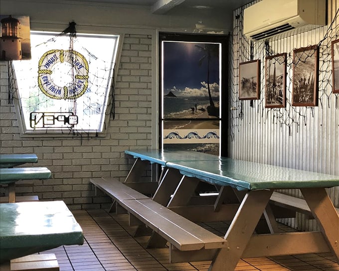 The dining area might be basic, but those picnic tables have witnessed countless moments of pure food joy. Sometimes ambiance comes from what's on your plate, not your surroundings.