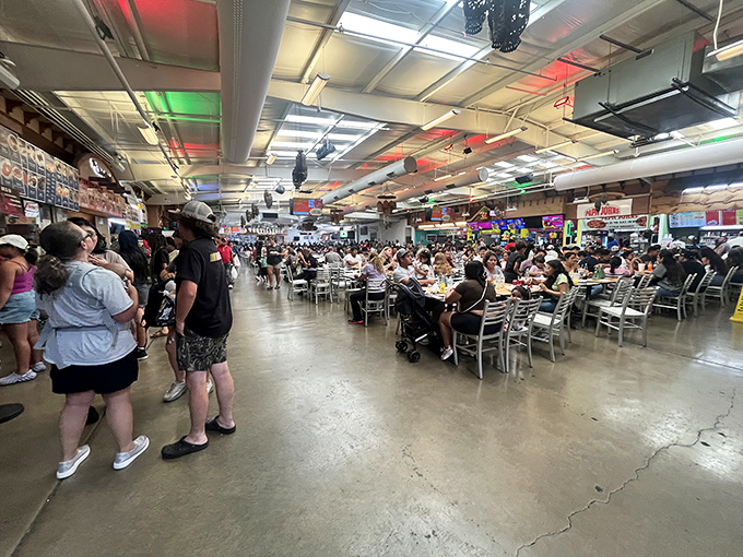 The food court hums with conversation and clinking utensils, a democratic dining hall where culinary traditions from across the Americas converge.
