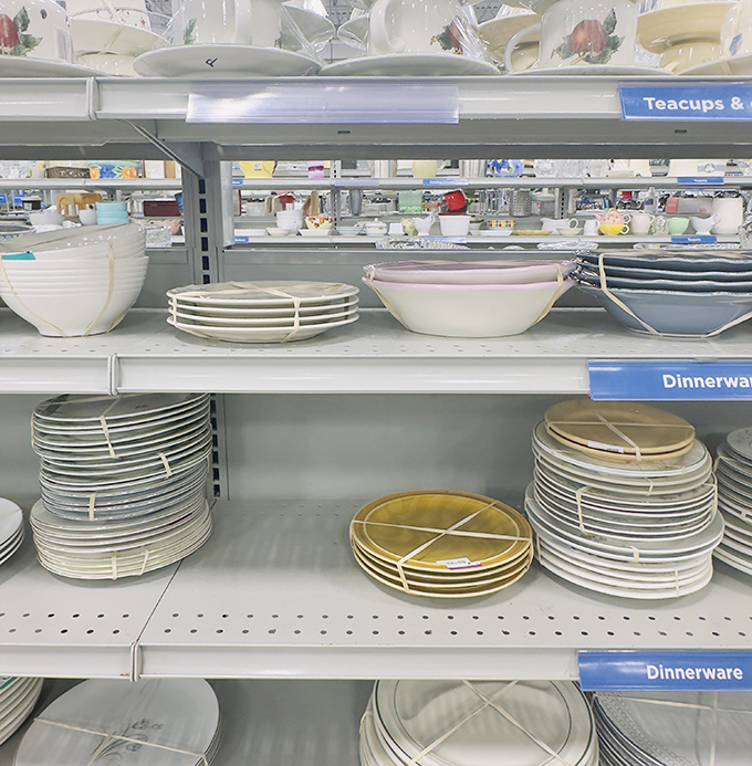 Dinnerware stacked with military precision, ready to transform your table from "microwave meal for one" to "who's coming to dinner?"