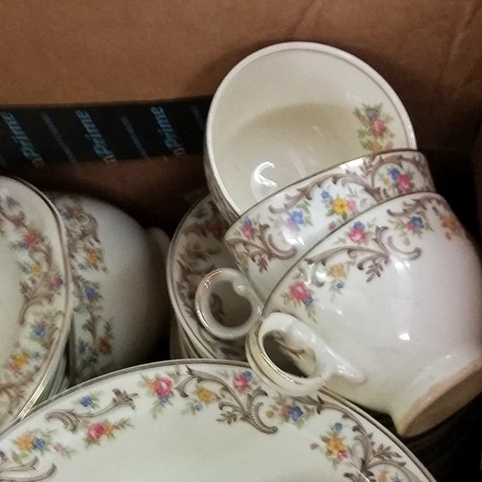 Delicate china teacups with floral patterns whisper stories of elegant afternoons and conversations from decades past, ready for new memories.