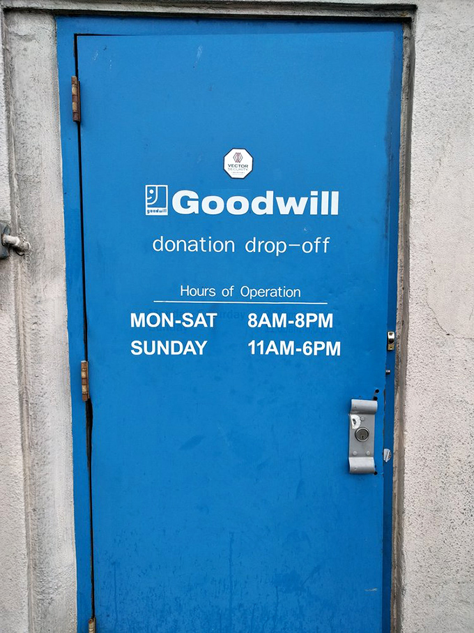 The blue donation door: where New Yorkers' cast-offs begin their journey to your shopping cart. The circle of stuff continues seven days a week.