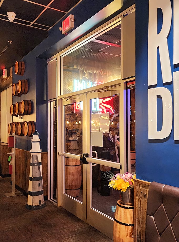 Nautical touches like barrel accents and lighthouse decor create an atmosphere that's both playful and transportive.