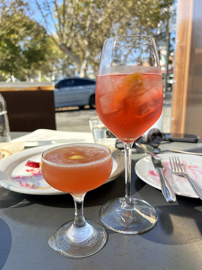 Cocktails the color of a San Francisco sunset. Sip slowly and pretend you're solving a film noir mystery.