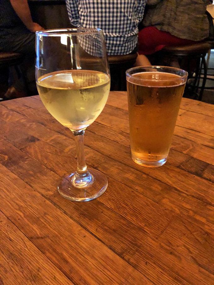 Wine and beer: civilization's oldest way of saying "good job making it through another day." The perfect companions to oak-fired perfection.