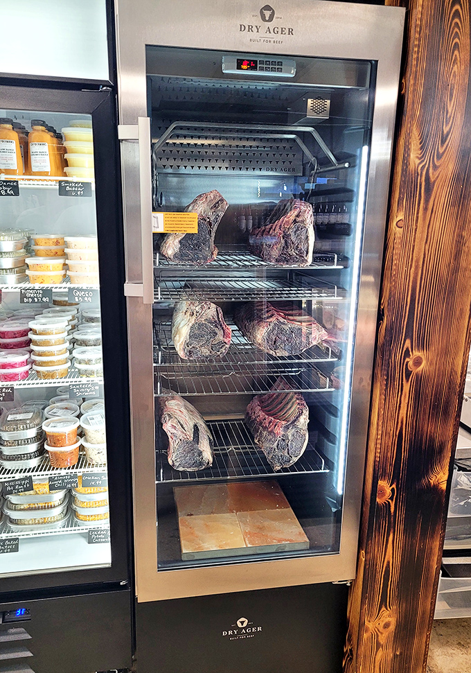 The dry-aging refrigerator—barbecue's version of a jewelry display case. Those beautiful cuts of meat are getting ready for their moment of glory.
