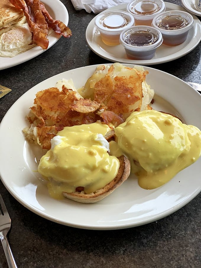 Eggs Benedict that's achieved perfection: English muffins with the right crunch, eggs poached to runny-yolk glory, and hollandaise sauce that's liquid gold.