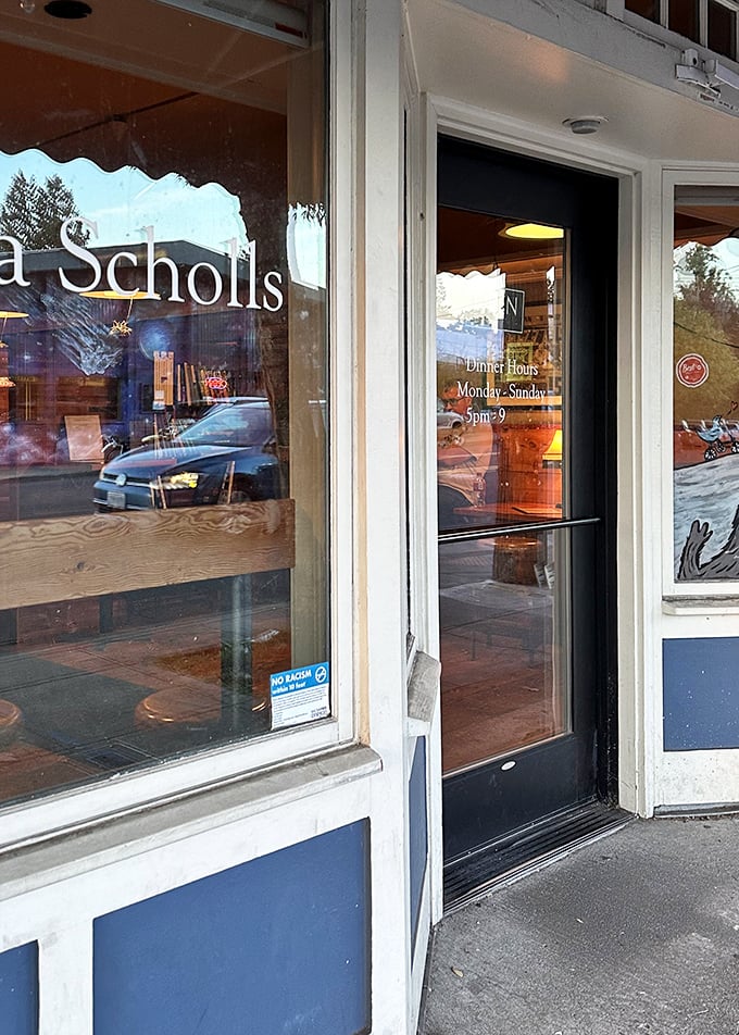 The entrance speaks volumes: simple, no-nonsense, and focused on what matters&mdash;getting you inside to eat exceptional pizza.