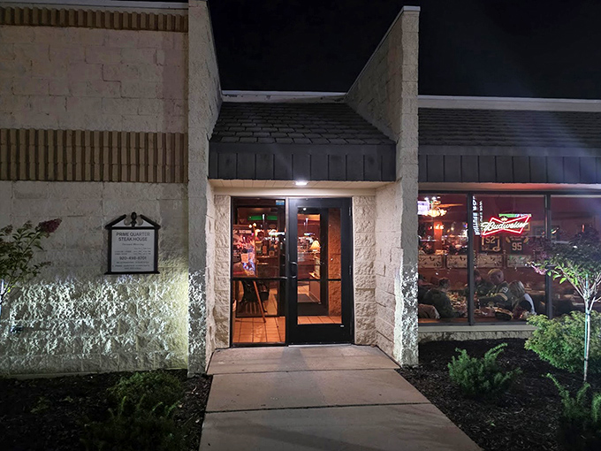 The entrance at night, glowing with promise like a beacon for the hungry. Step inside and leave your diet resolutions at the door.