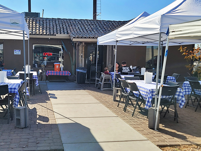 The entrance beckons with promise of flavors that have sustained desert peoples for generations&mdash;no password required, just an appetite.