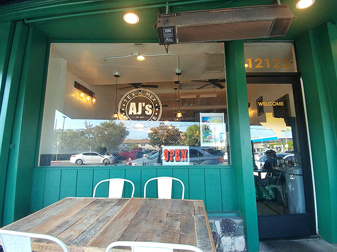 The green exterior pops against the California blue sky, while those wooden tables await your barbecue pilgrimage.
