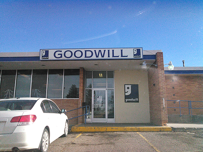 Clean entrance, clear signage, and that distinctive blue stripe welcoming bargain hunters to their happy place.