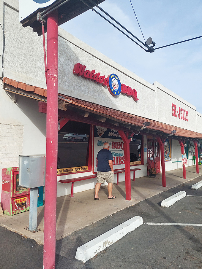 The entrance that's witnessed countless BBQ pilgrims arriving hungry and leaving with that special kind of food happiness that only slow-smoked meat can deliver.
