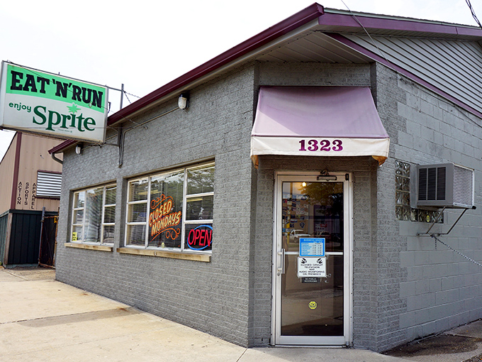 The pink awning beckons like a breakfast lighthouse. This doorway has welcomed hungry Akronites through economic booms, busts, and everything between. 