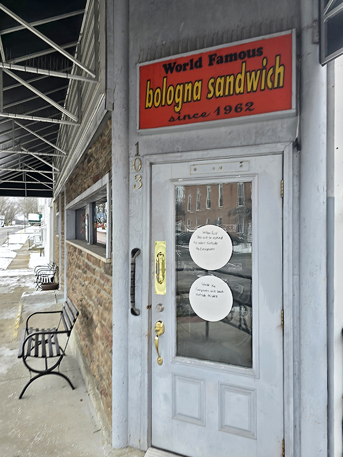 "World Famous bologna sandwich since 1962" &ndash; a door that separates the ordinary world from an extraordinary culinary experience waiting inside.
