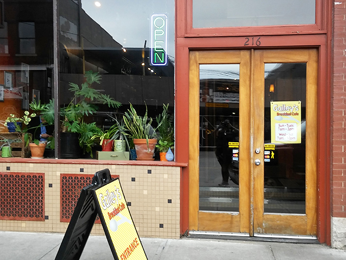 The entrance to breakfast nirvana, complete with potted plants standing guard. Those wooden doors have welcomed countless hungry souls.