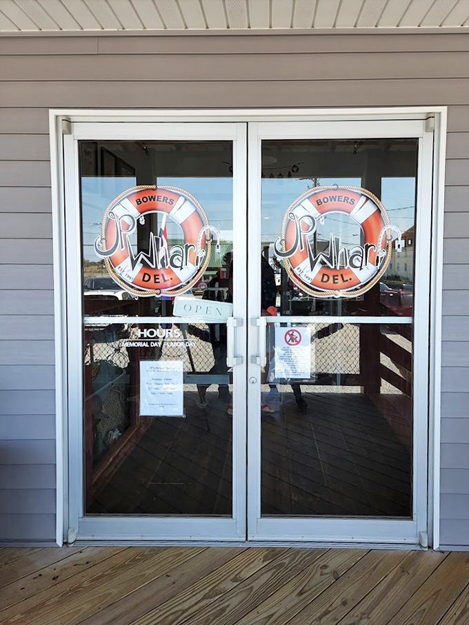 The entrance invites you inside where Bowers Beach seafood traditions meet plates that'll make you reconsider ever eating anywhere else.
