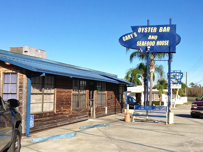 The entrance to Gary's stands like a portal to seafood nirvana, with that iconic blue sign promising briny delights within.