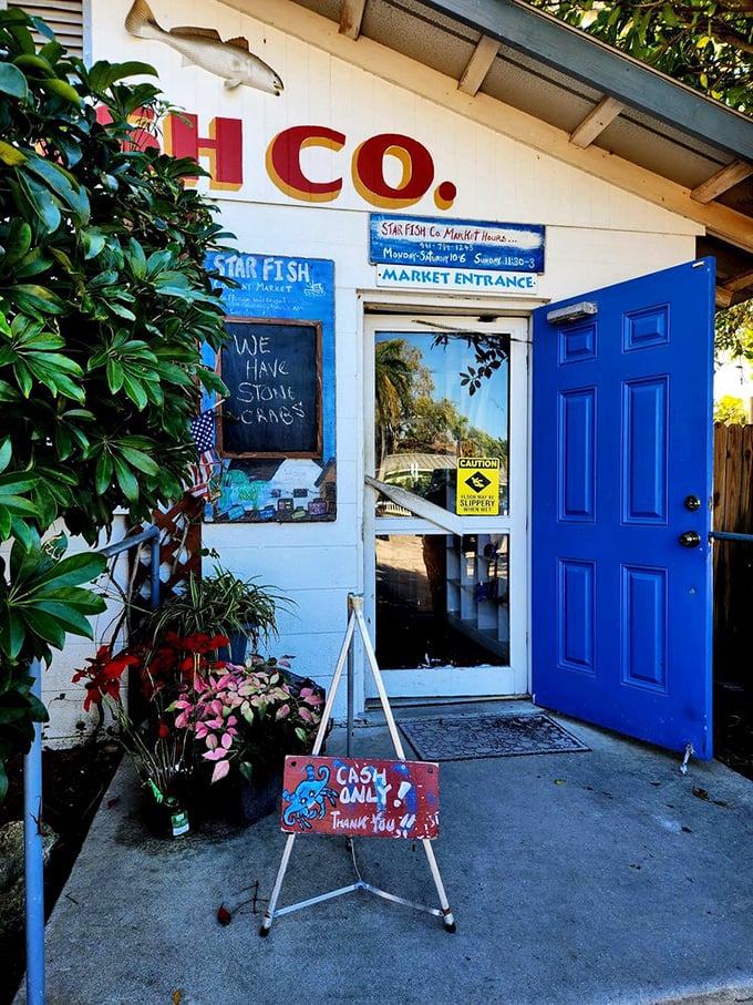 The blue door to bliss. That "Cash Only" sign isn't a deterrent&mdash;it's a promise of authenticity.