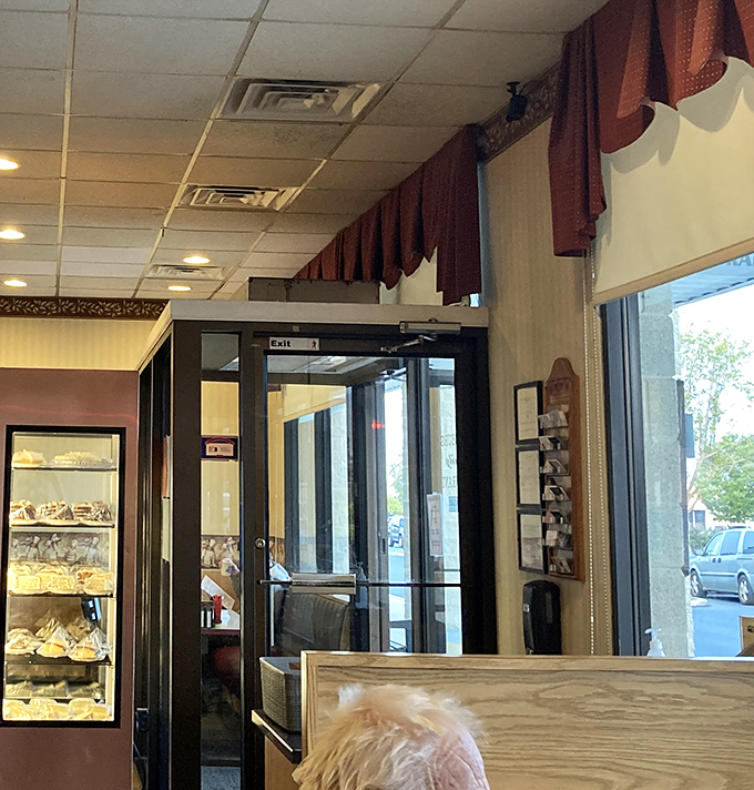 A dessert case that whispers sweet temptations as you exit. The perfect setup for the "we should get some pie for later" impulse purchase.