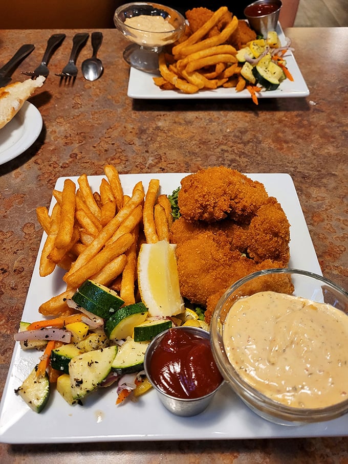 Golden-fried perfection meets hand-cut fries in a dish that proves sometimes the classics become classics for a very good reason.