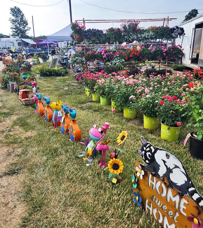 Blooms and whimsy create a garden center oasis. Those bright buckets of flowers make even my notorious plant-killing thumbs feel momentarily green. 
