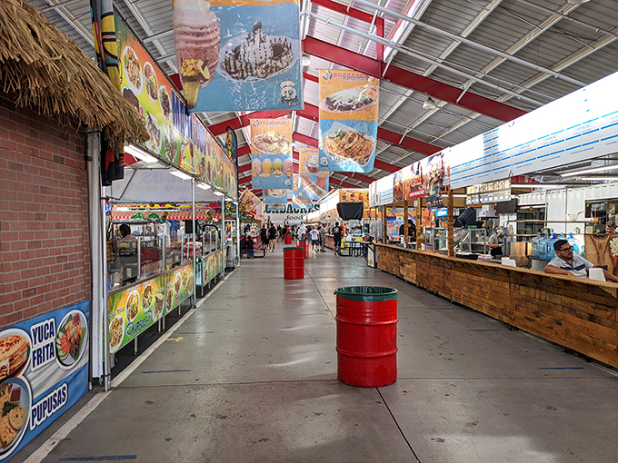Food hall nirvana where the red barrel stands sentinel, guarding the sacred pathway between hungry shoppers and culinary satisfaction.